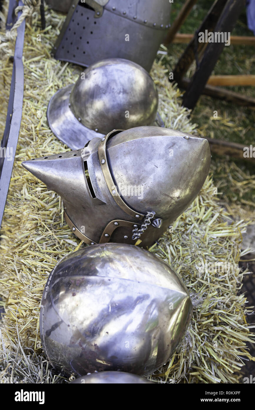 Old medieval helmets, detail of some ancient war helmets, protection ...