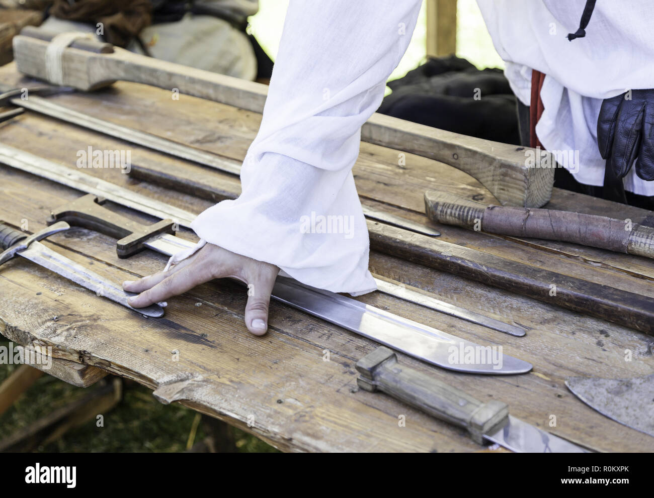 Exhibition of medieval weapons, detail of some ancient swords of war ...