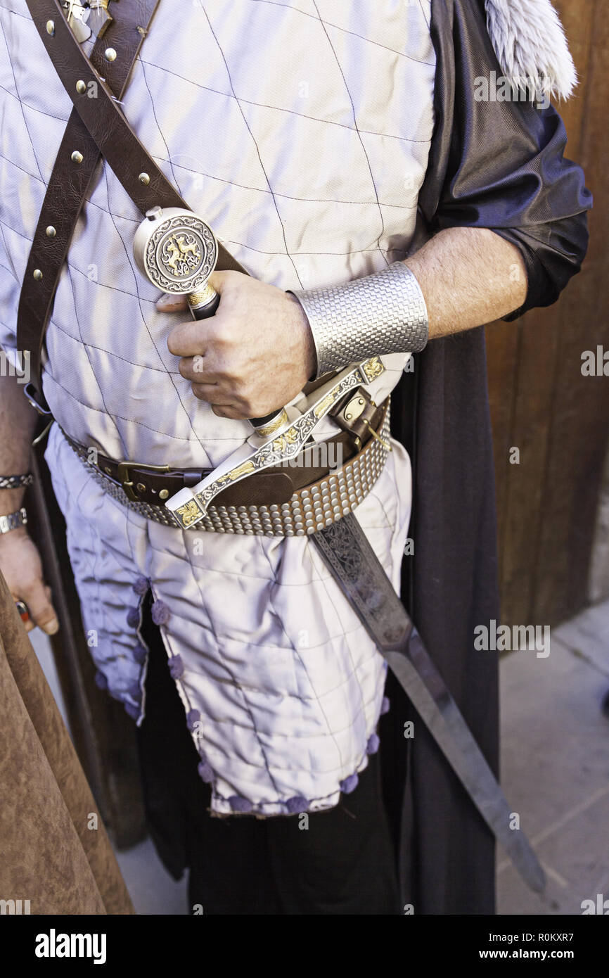 Medieval warrior with sword, detail of a medieval man Stock Photo - Alamy