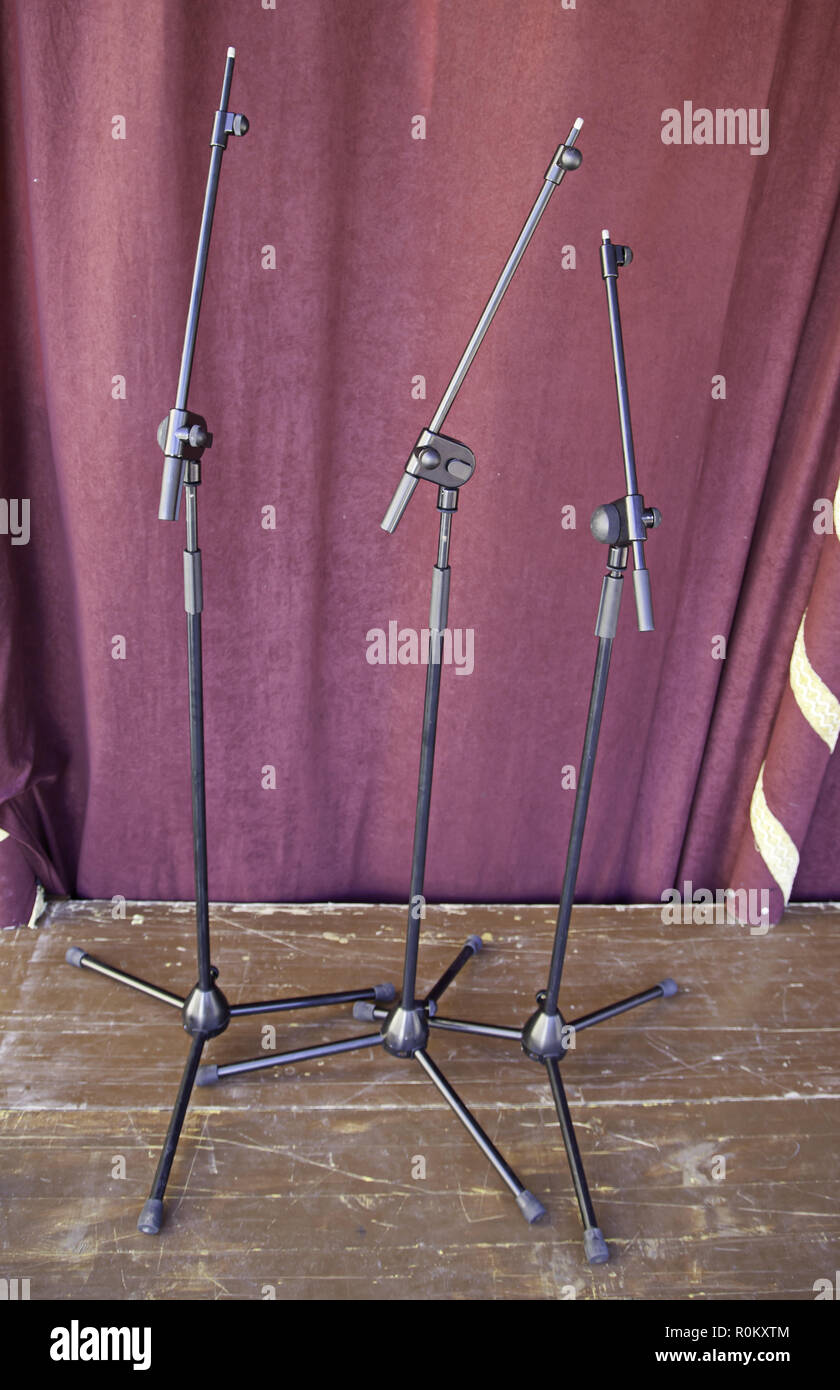 Microphones on stage, detail of feet of microphone on a show, concert ...