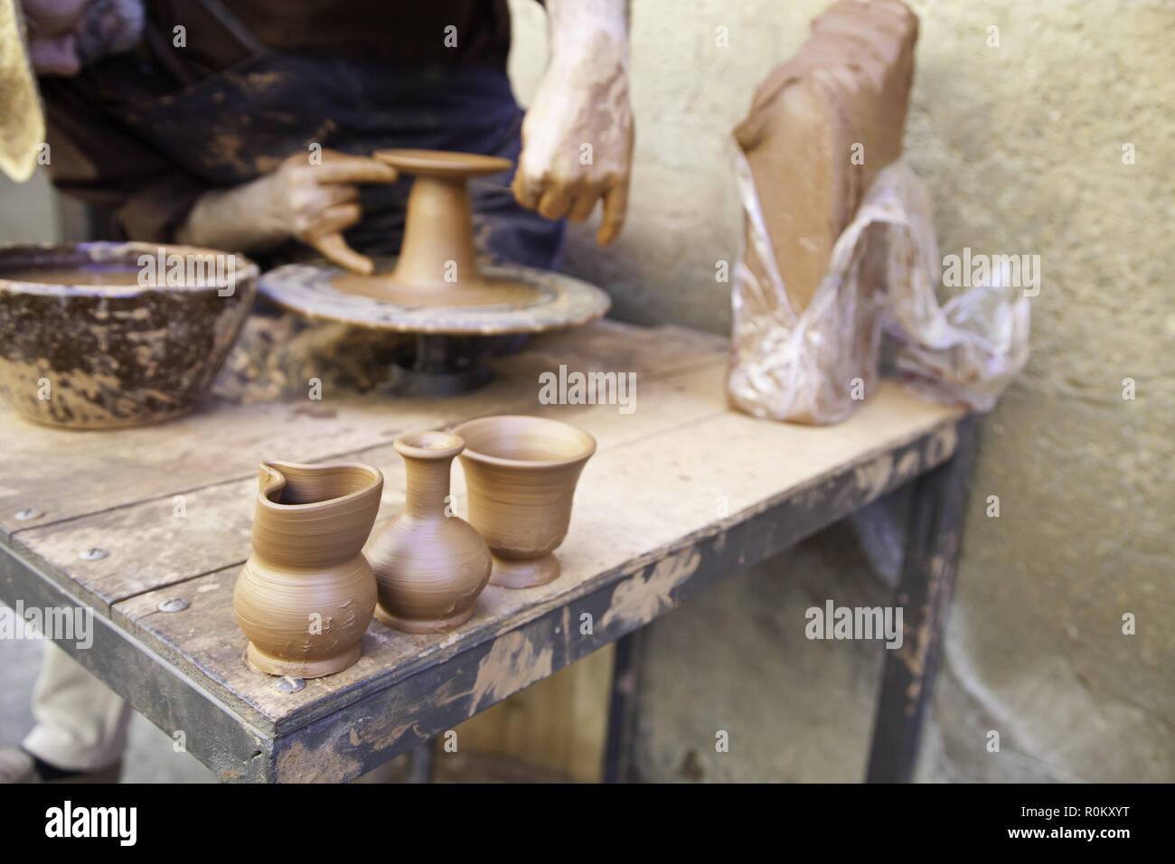 Craftsman potter, detail of a clay worker hands Stock Photo - Alamy