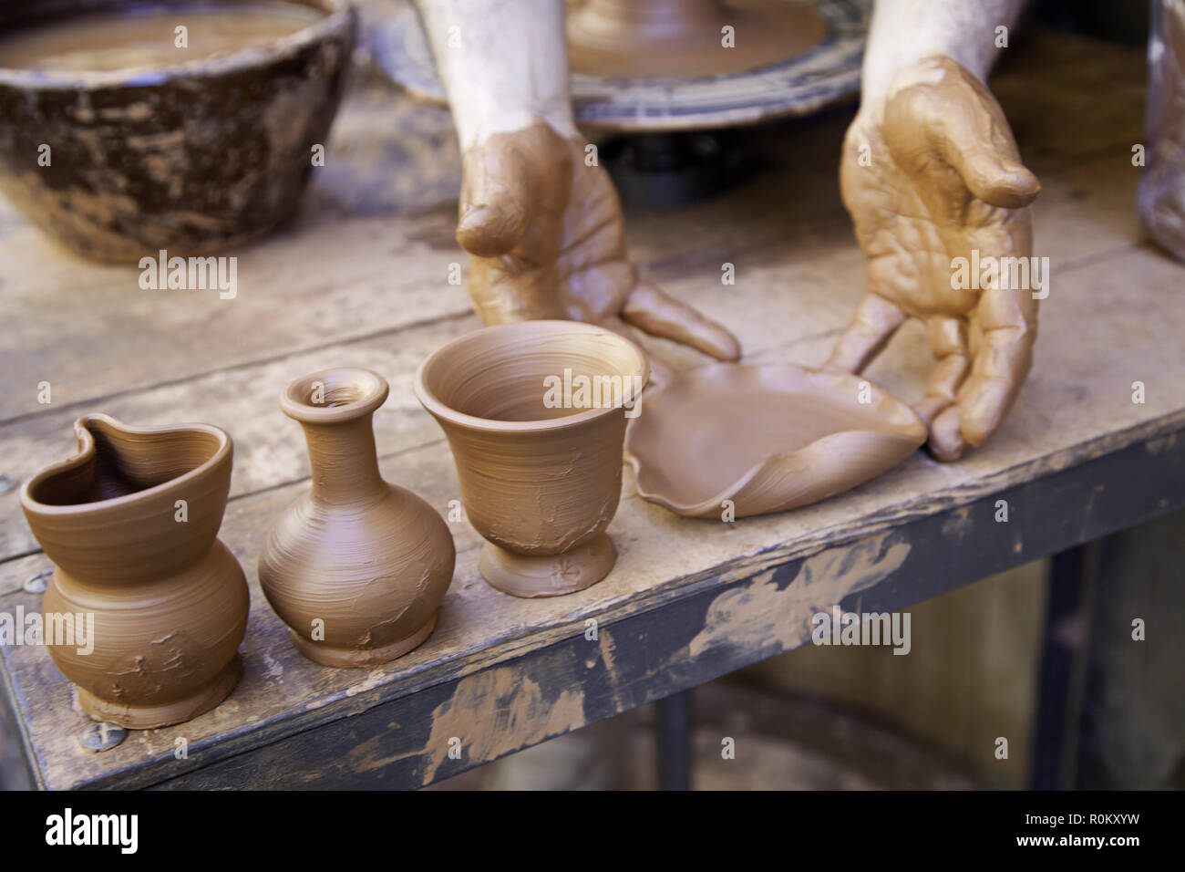 Clay worker, craftsman detail of a street worker, potter Stock Photo ...