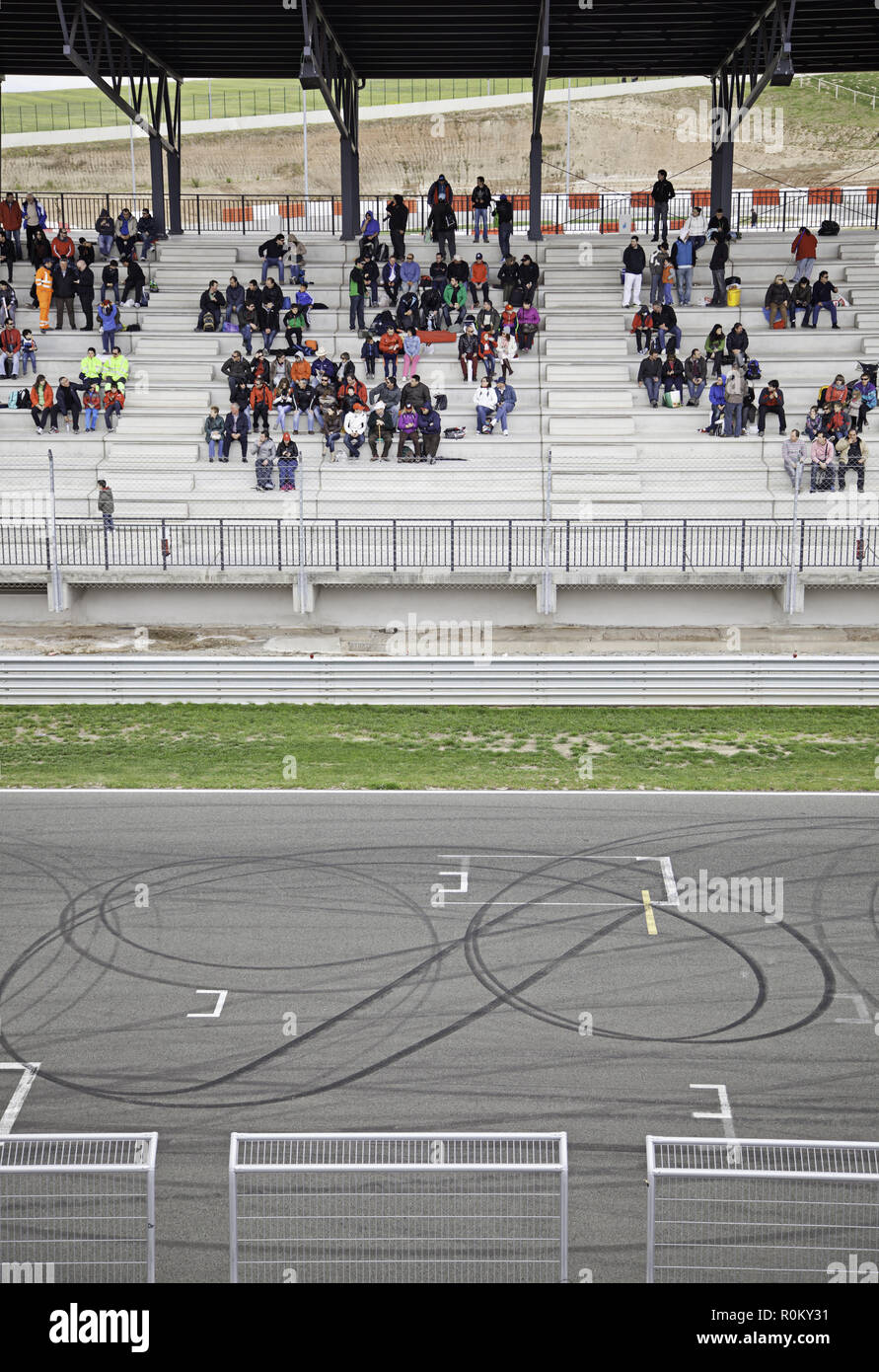Speedway professional, detail of a tennis competition with spectators ...