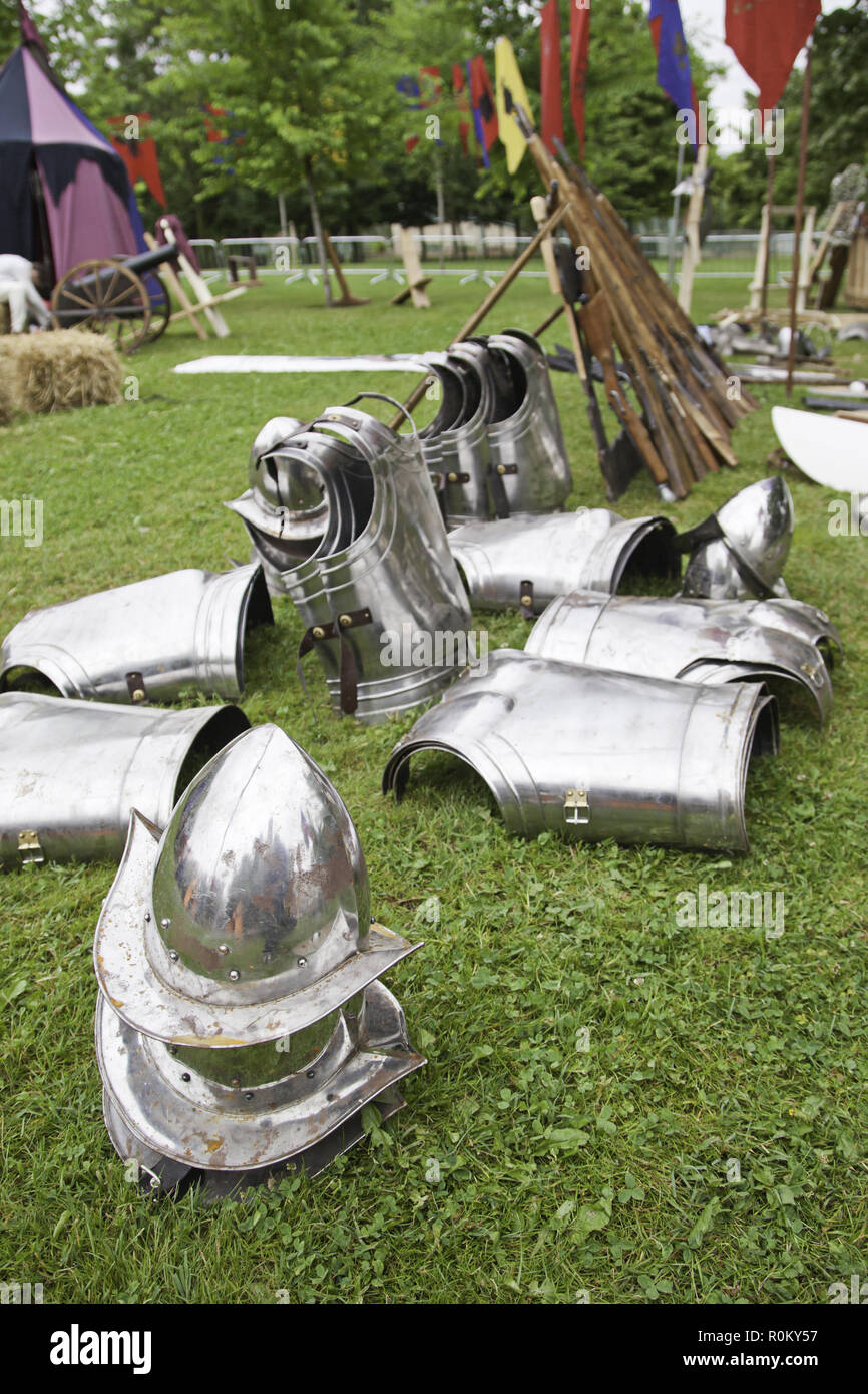 Helmets and medieval armor parts, detail of an ancient war armor, pain ...