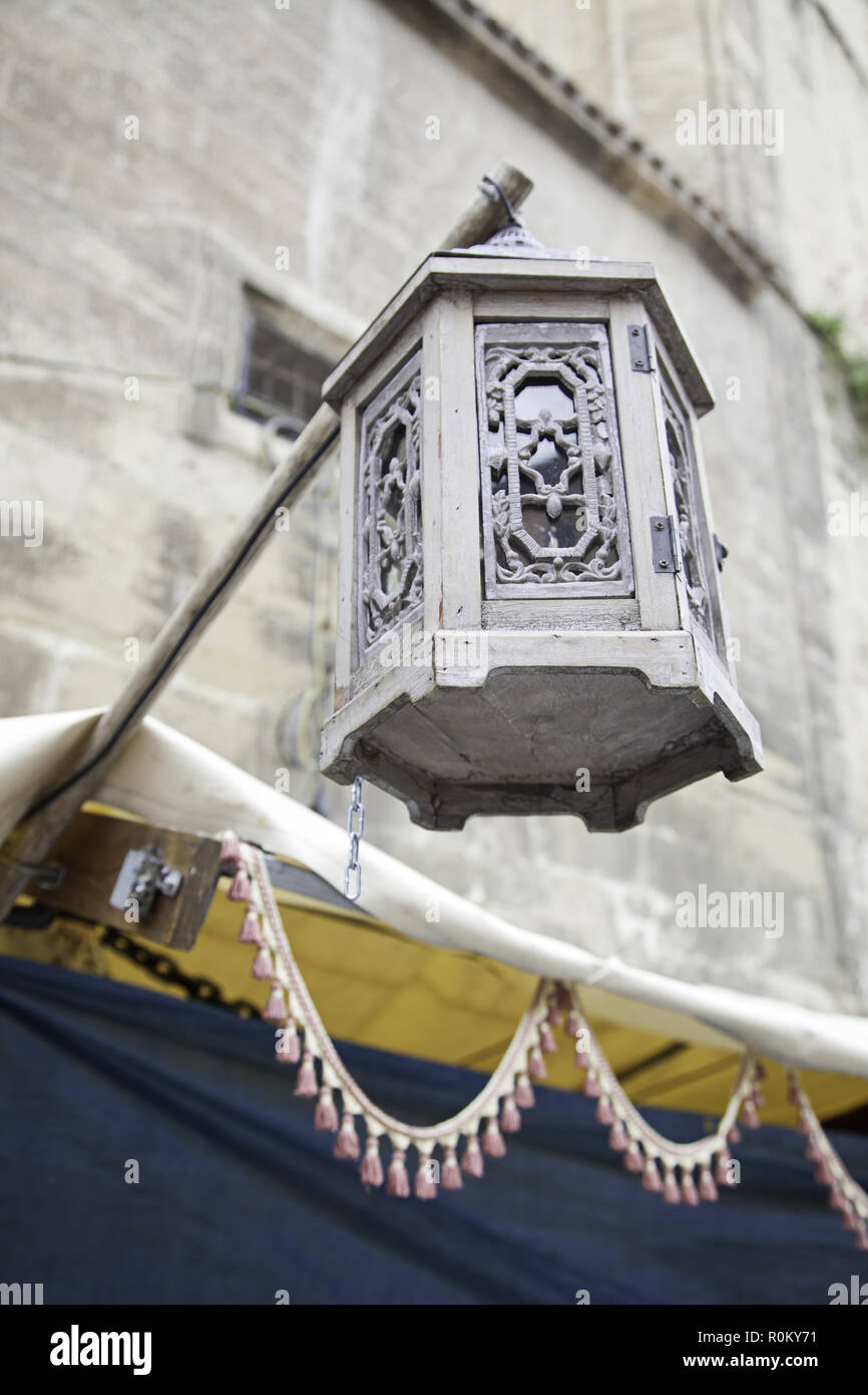 Medieval wooden lamp, detail of old medieval decoration, lighting ...