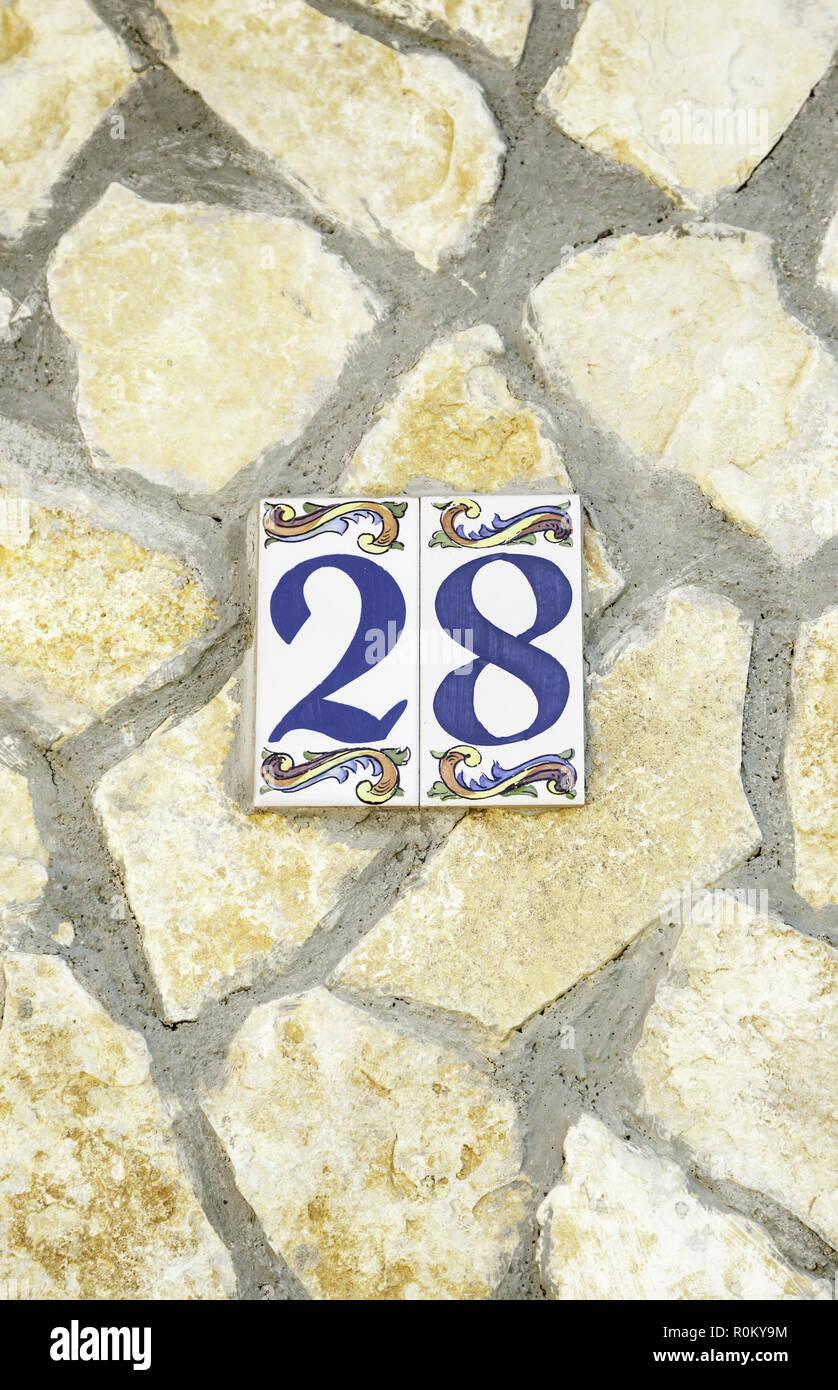 Number twenty-eighth in a stone wall, detail information about numbers ...
