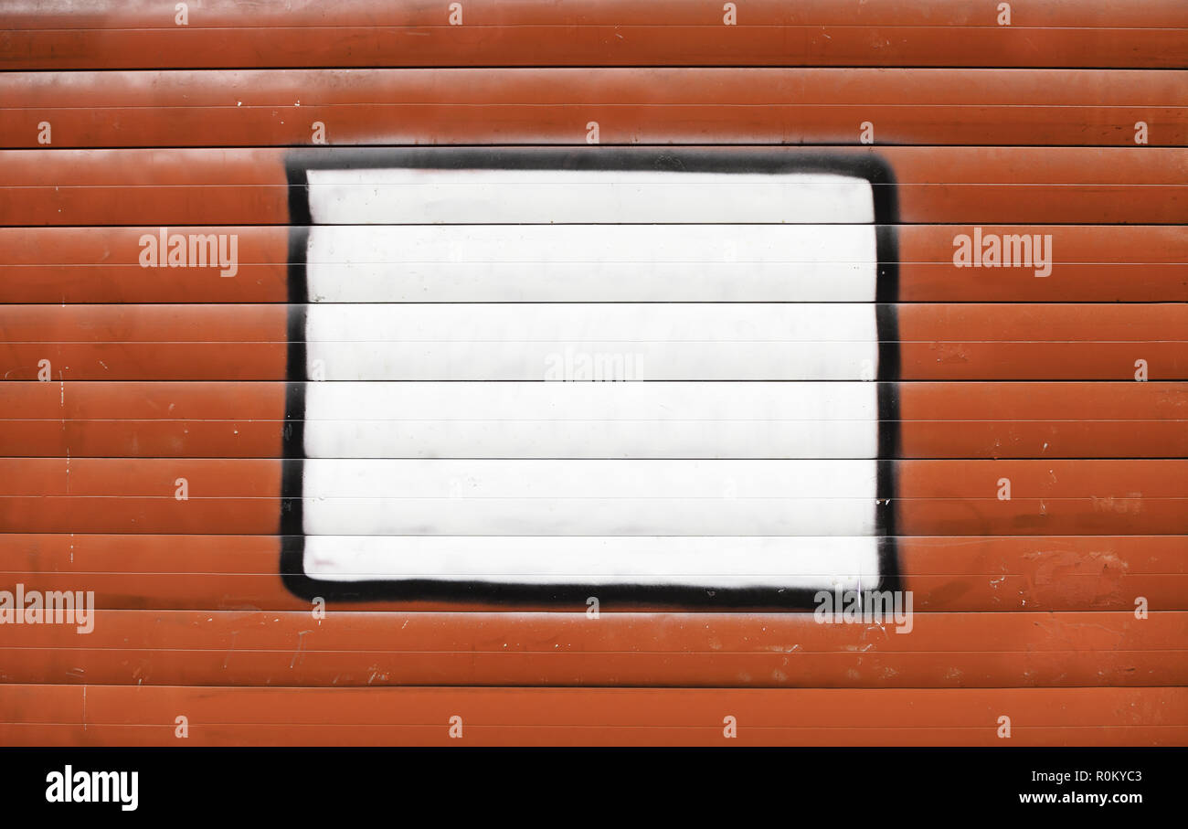 Wall painted with a red frame detail of a metal fence painted and ...