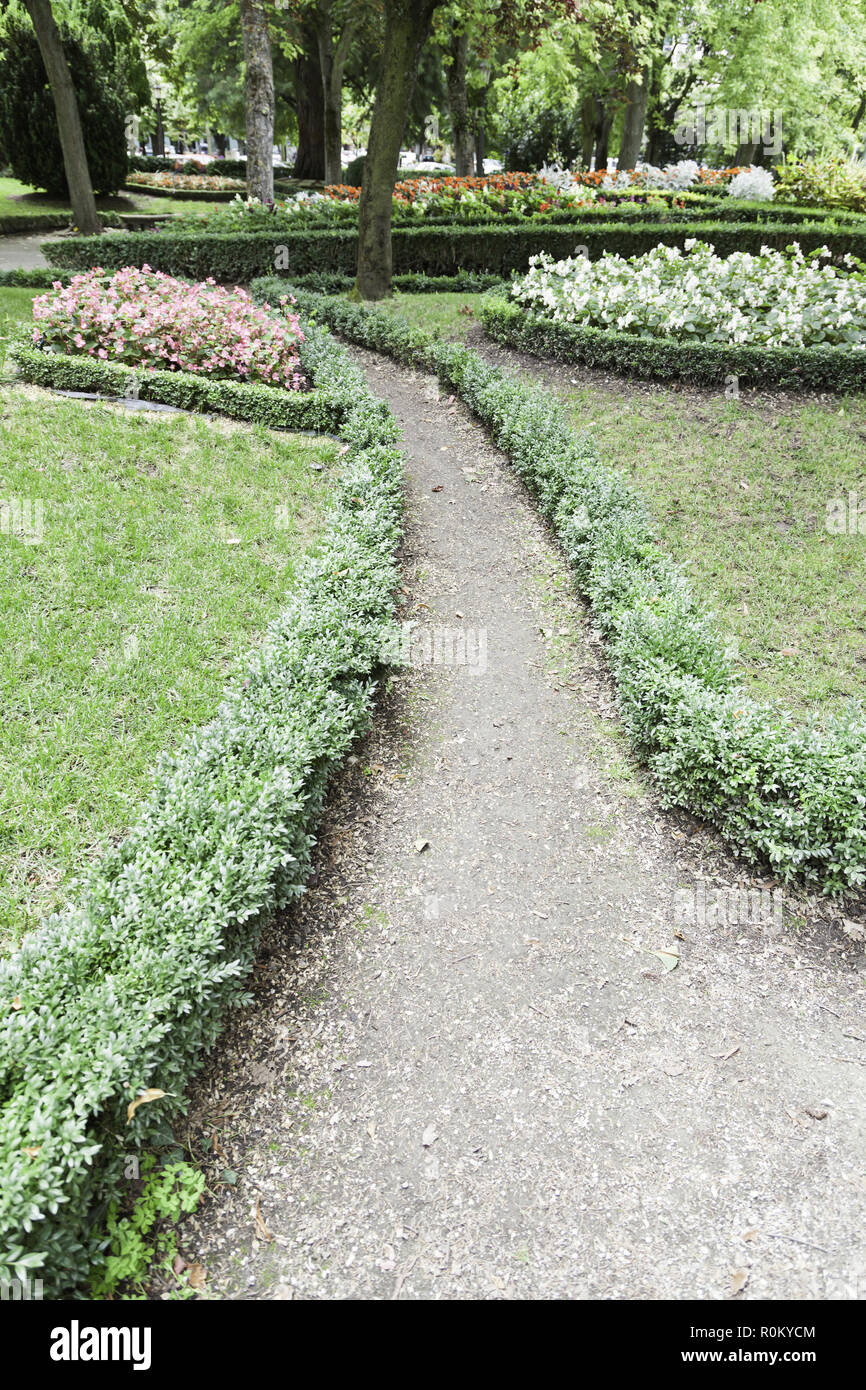 Path in a garden, detail of a walk in a botanical garden, nature walk ...