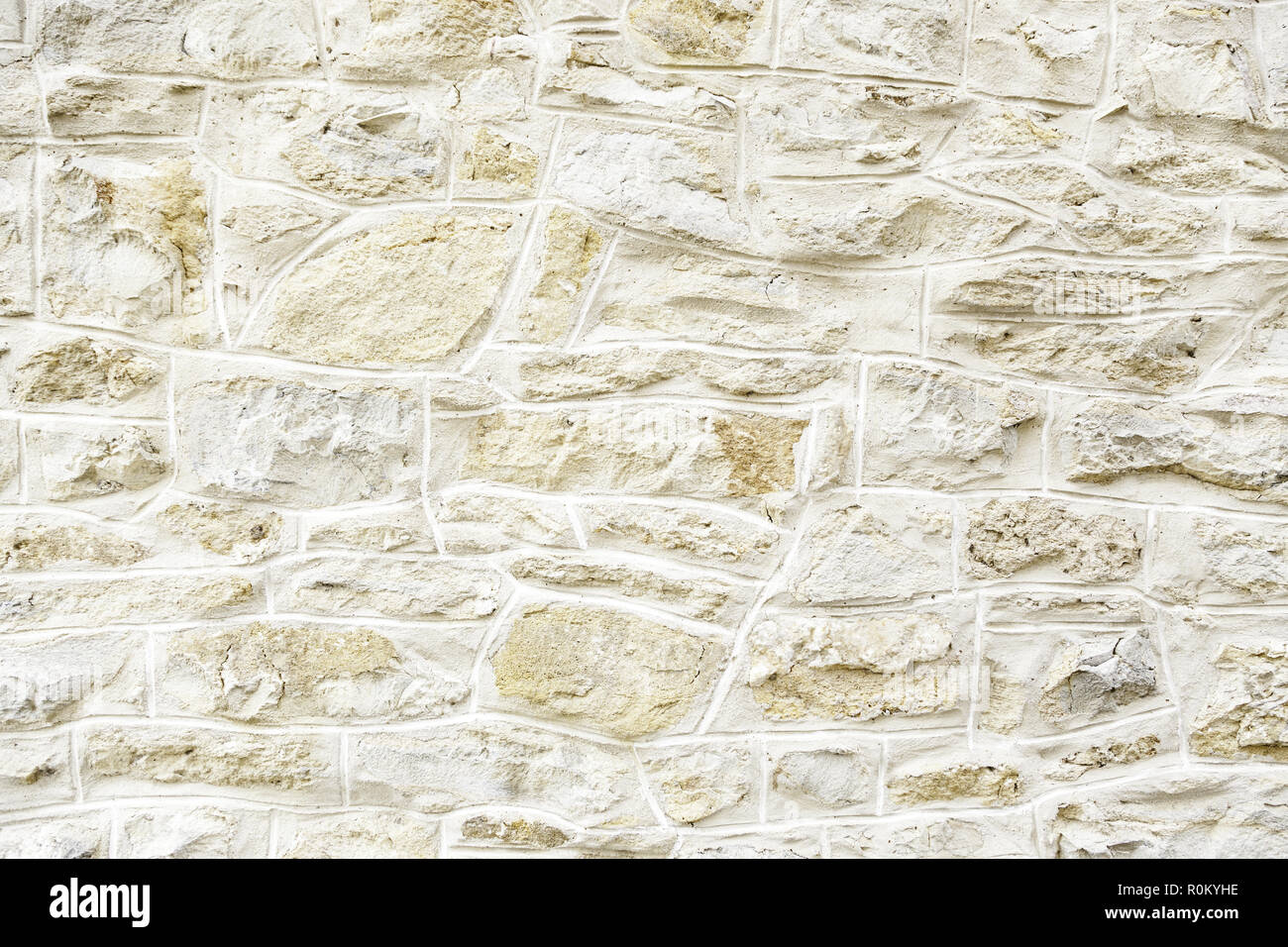Wall stone texture, detail of a stone background, decoration on facades ...