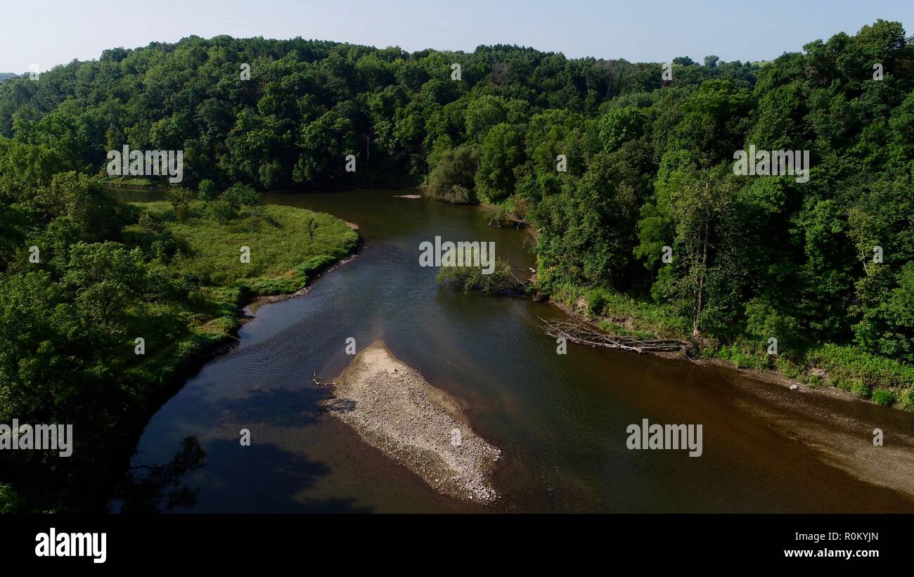 Aerial view of woods forests along Zumbro River, with island in center ...