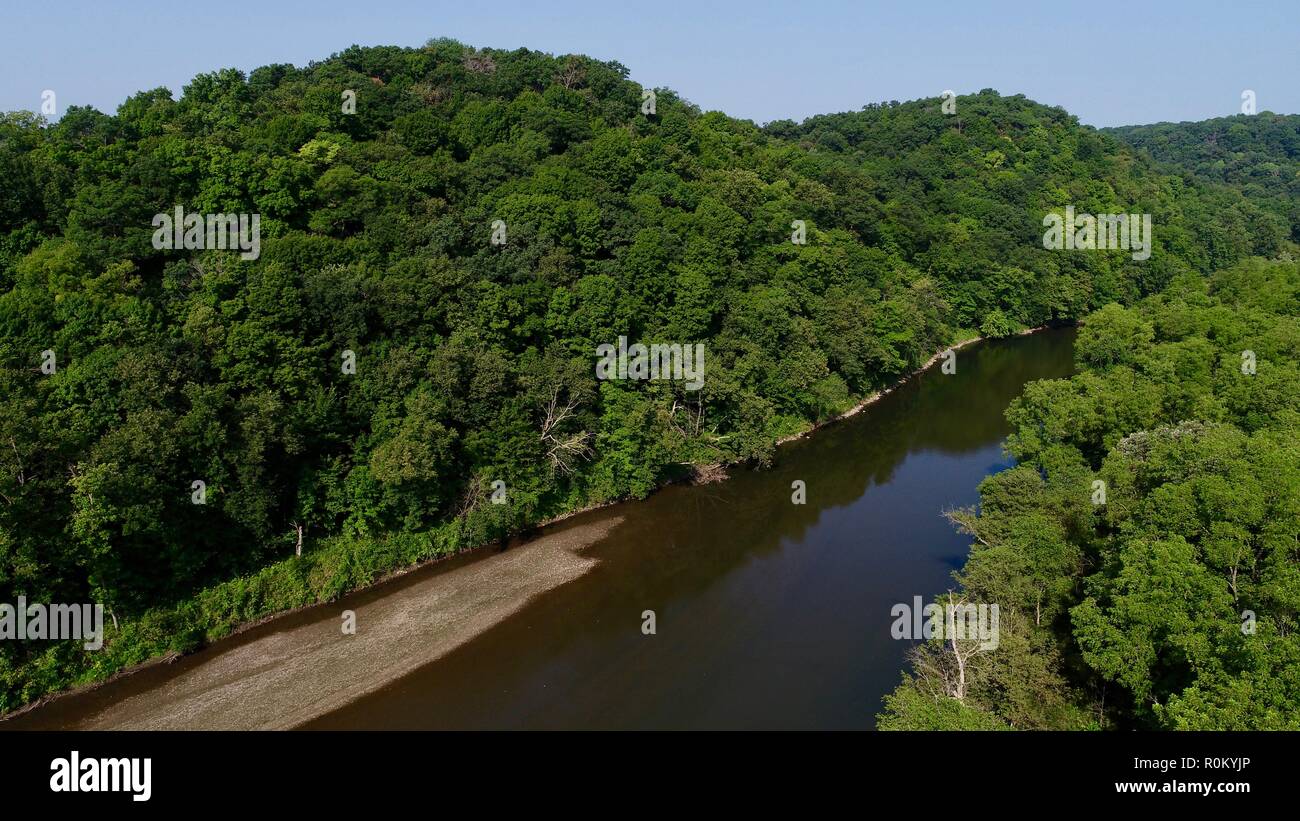 Aerial view of woods forests along Zumbro River, with island in center ...