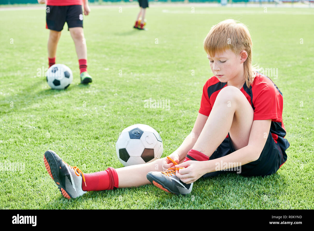 Young Football Player Stock Photo - Alamy