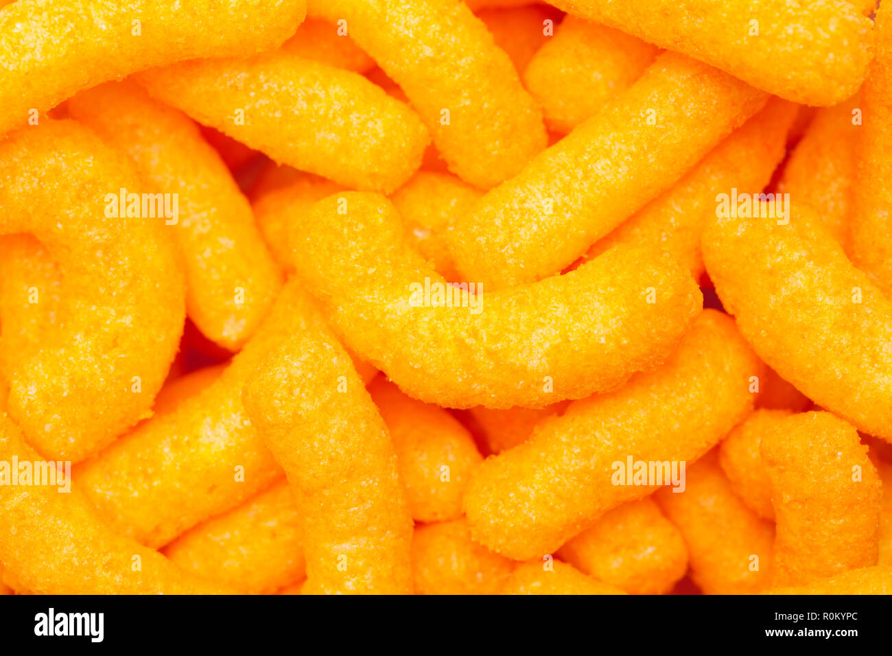 Crunchy cheese puffs hi-res stock photography and images - Alamy