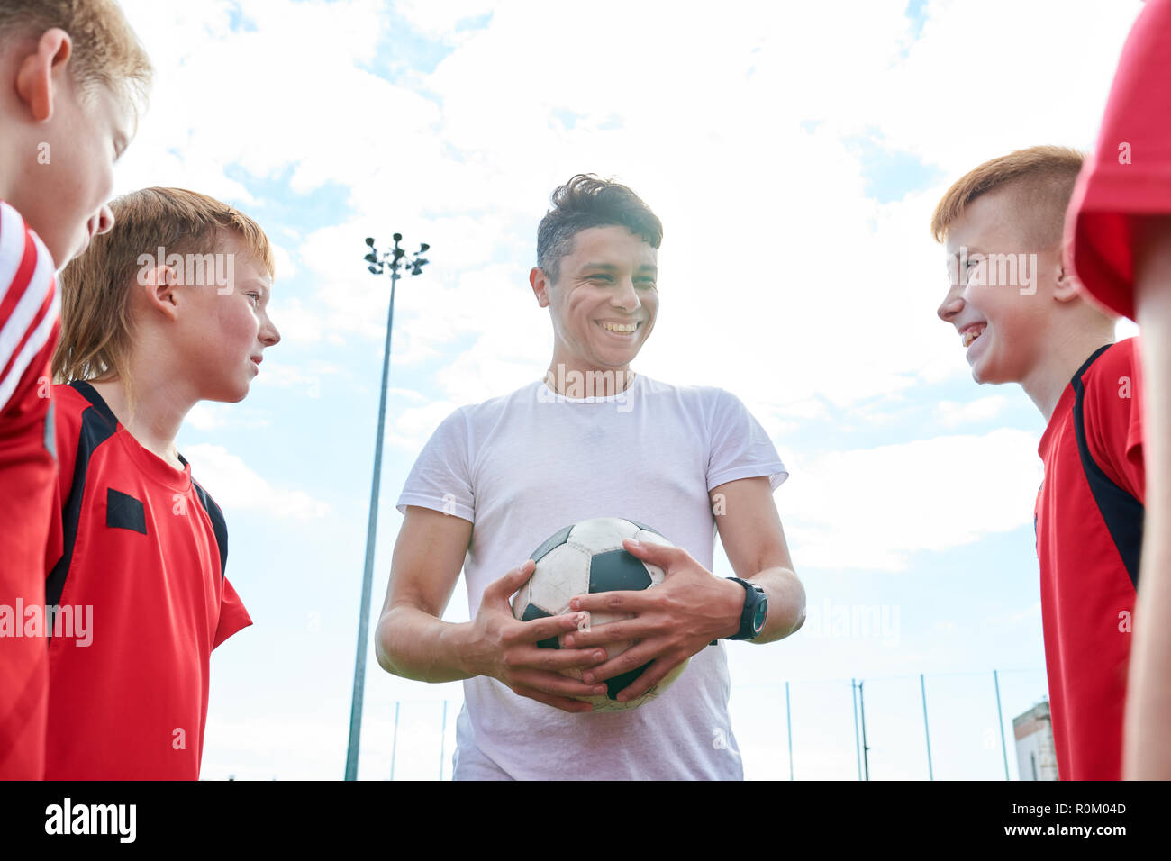 Young Football Coach Stock Photo - Alamy