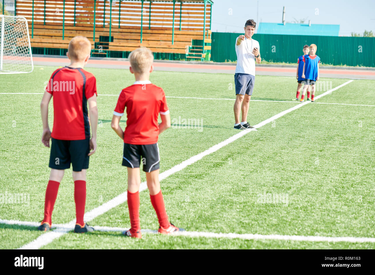 Kids exercising outdoors hi-res stock photography and images - Alamy