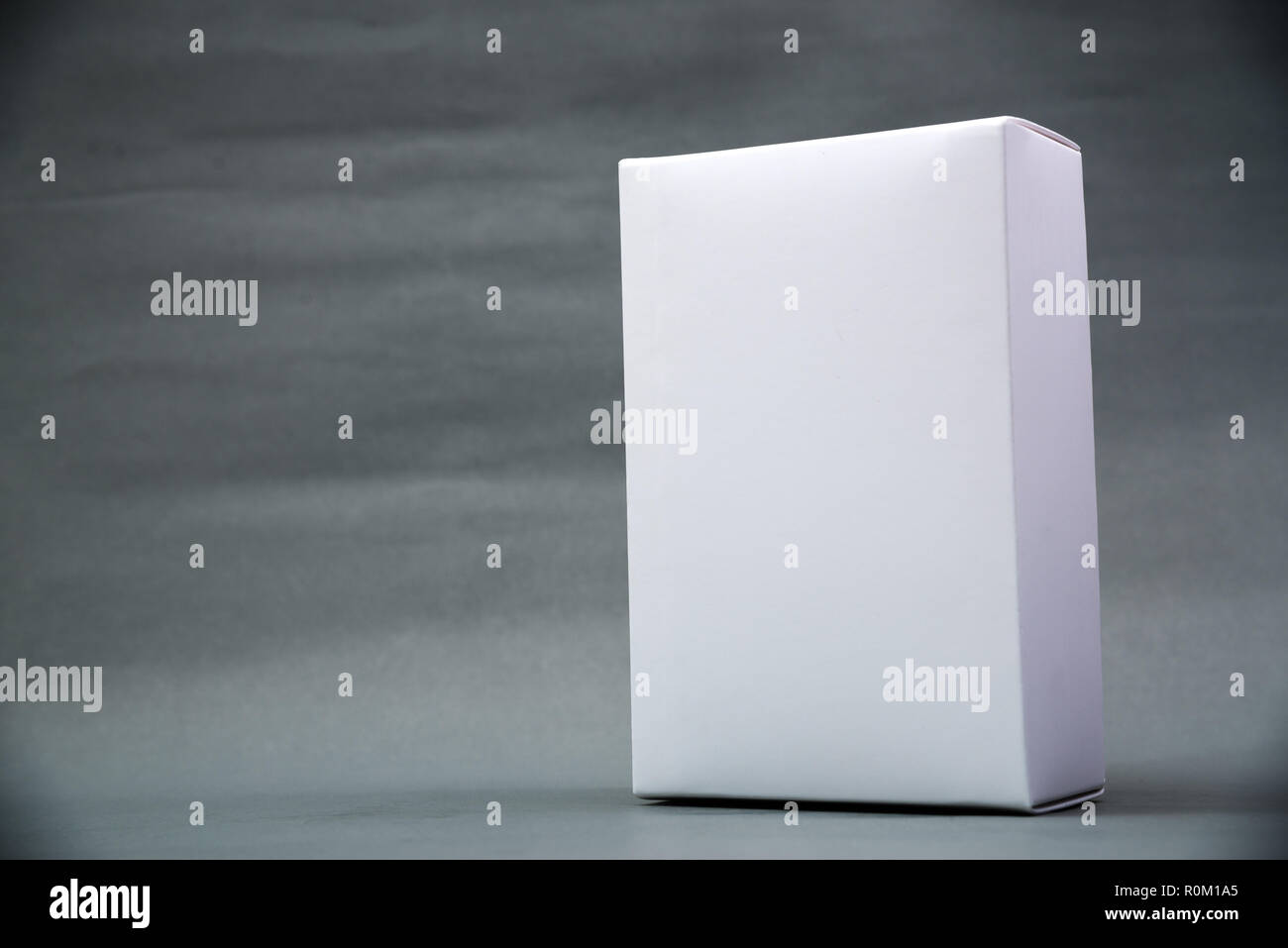 Empty Package white cardboard box or tray mock up for product on grey ...