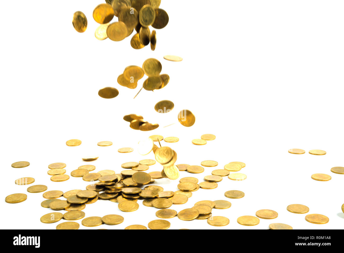 Falling gold coins money isolated on the white background, business ...