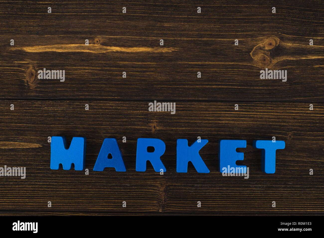 MARKET text letters word on wood table, with copy space for add ...