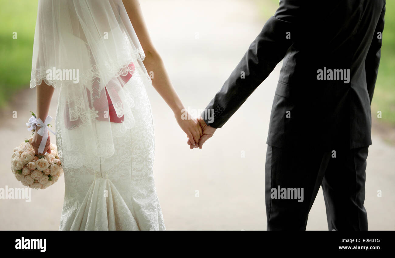 Bride and groom back view hi-res stock photography and images - Alamy