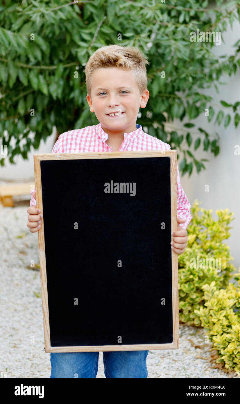 Child holding slate hi-res stock photography and images - Alamy
