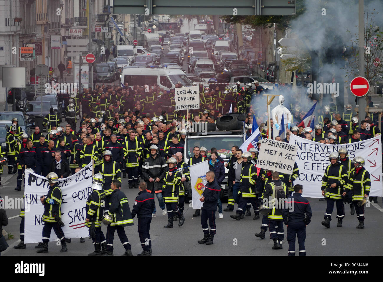 Hundreds of angry firefighters march in Lyon, France Stock Photo - Alamy