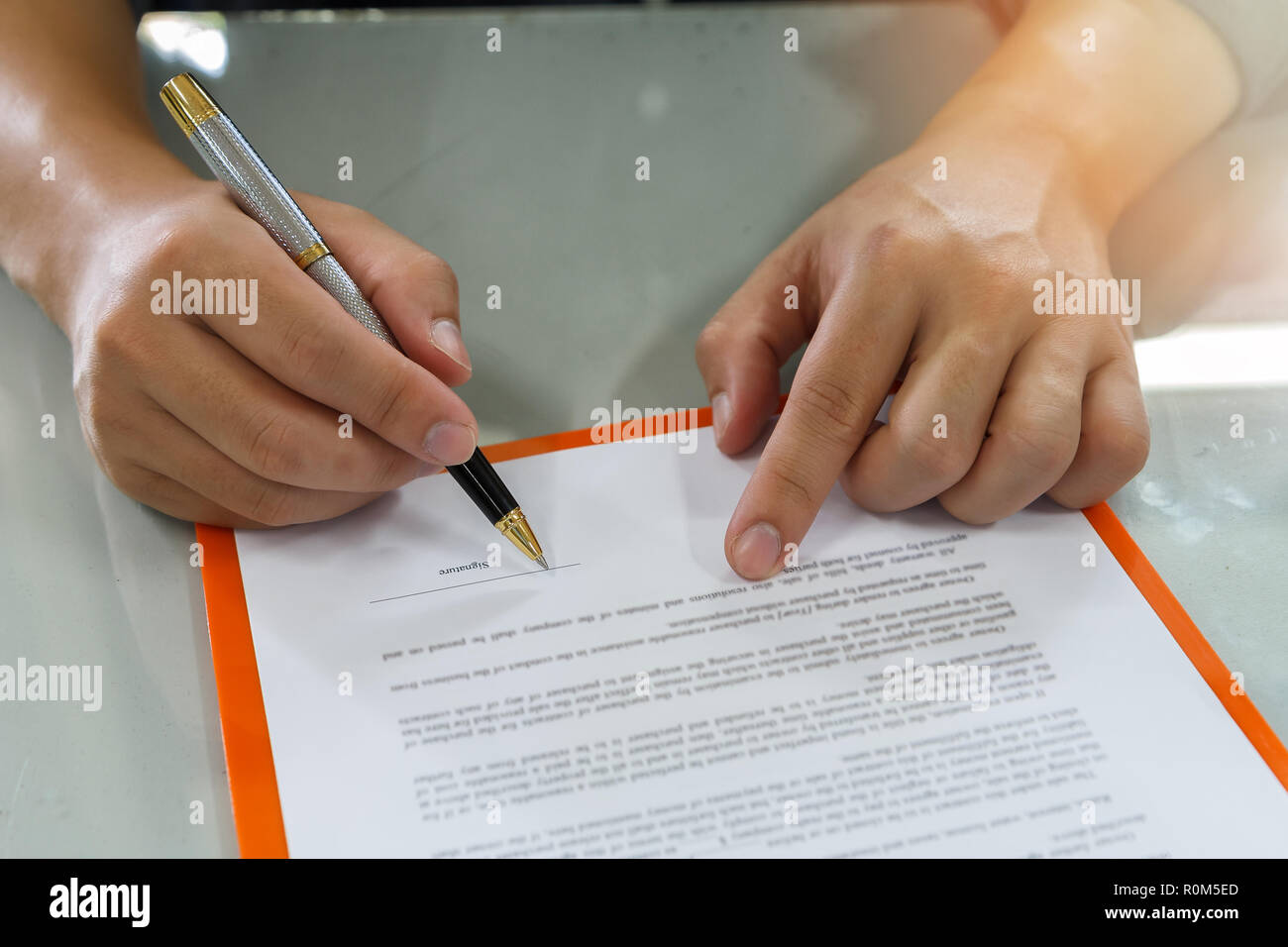 Close up of business man signing contract making a deal, business ...