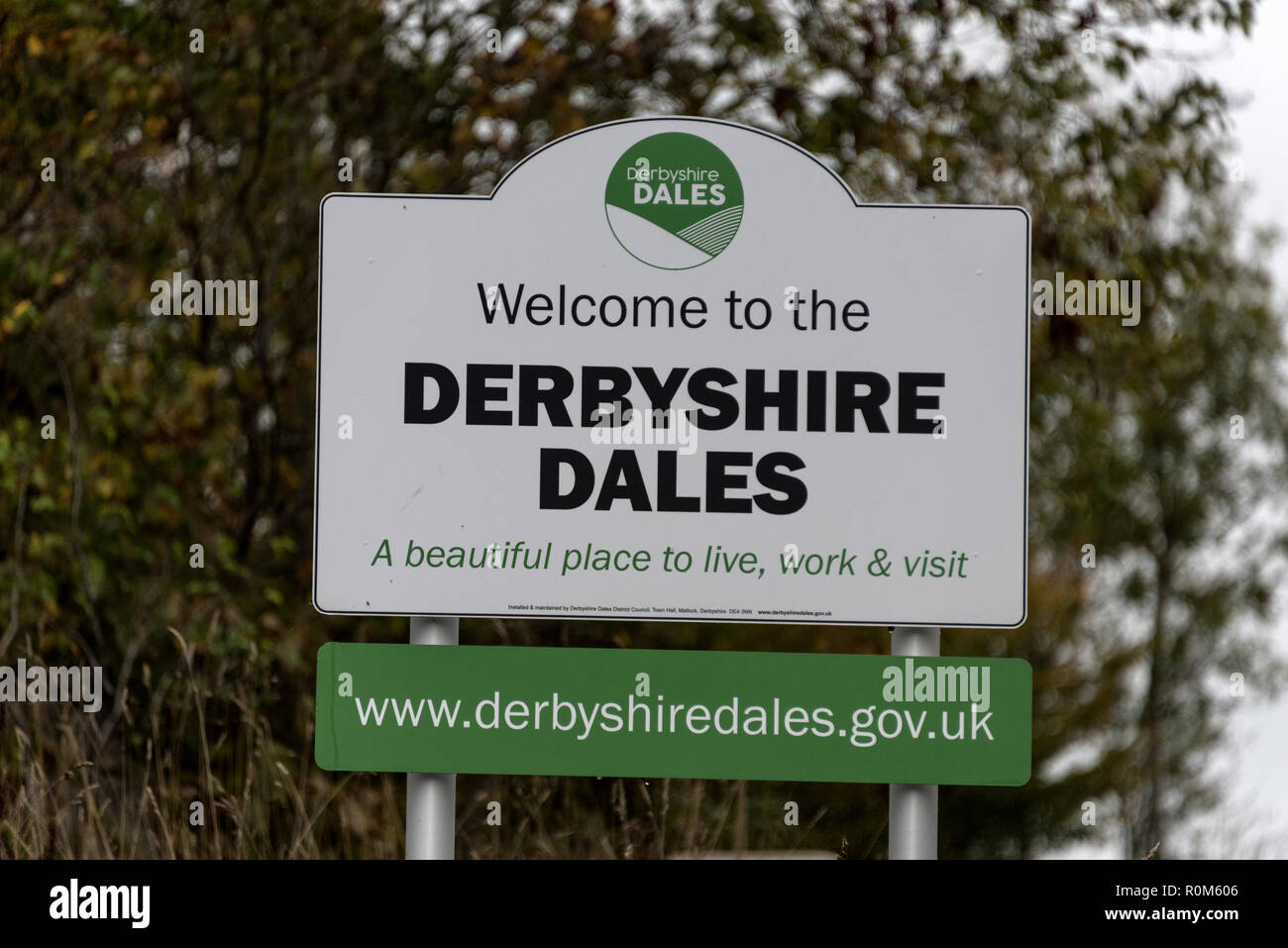 A visitors road sign: Derbyshire Dales, in the Peak District National ...