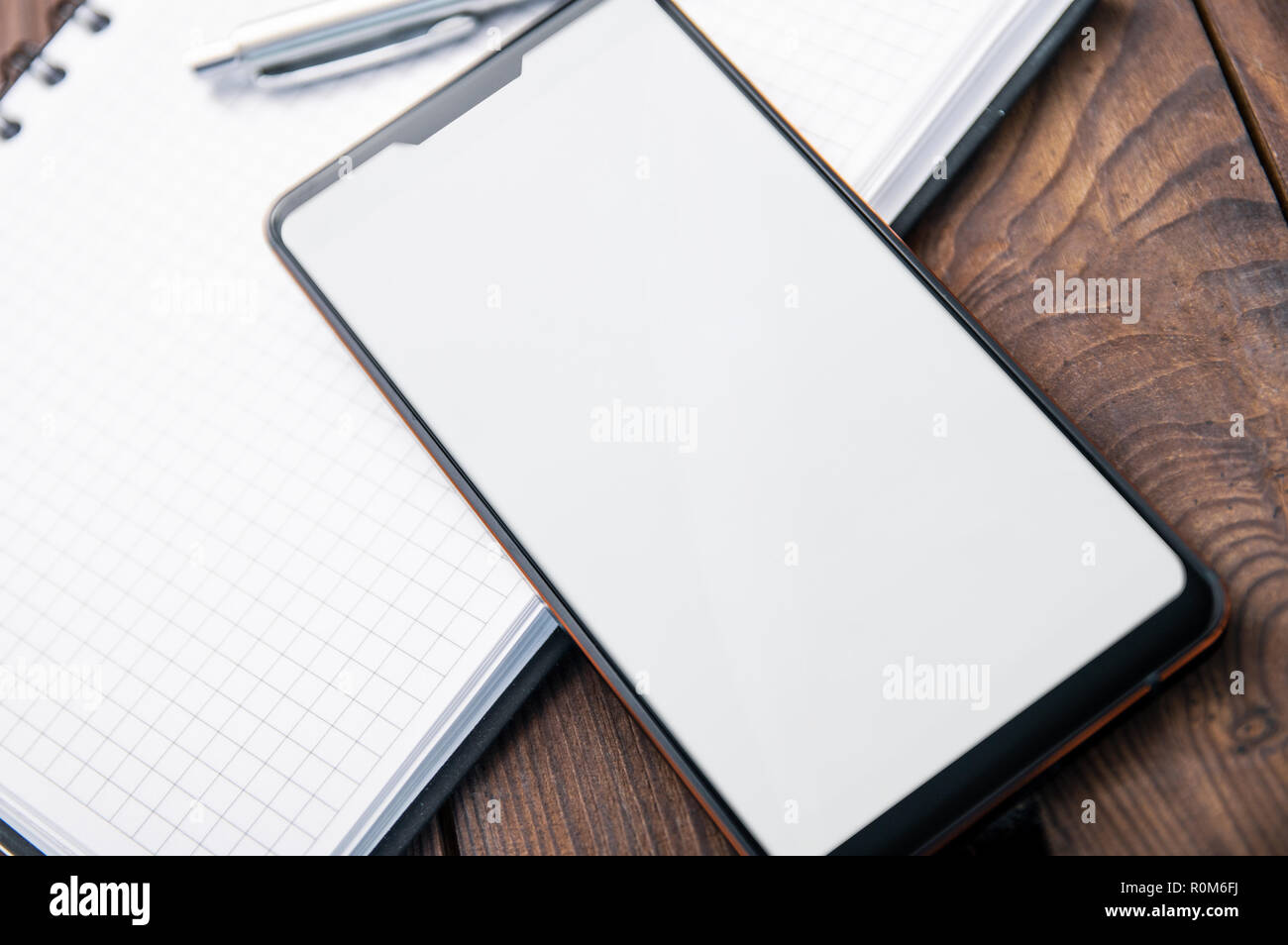 Modern smartphone with notch and white screen cutted off Stock Photo ...