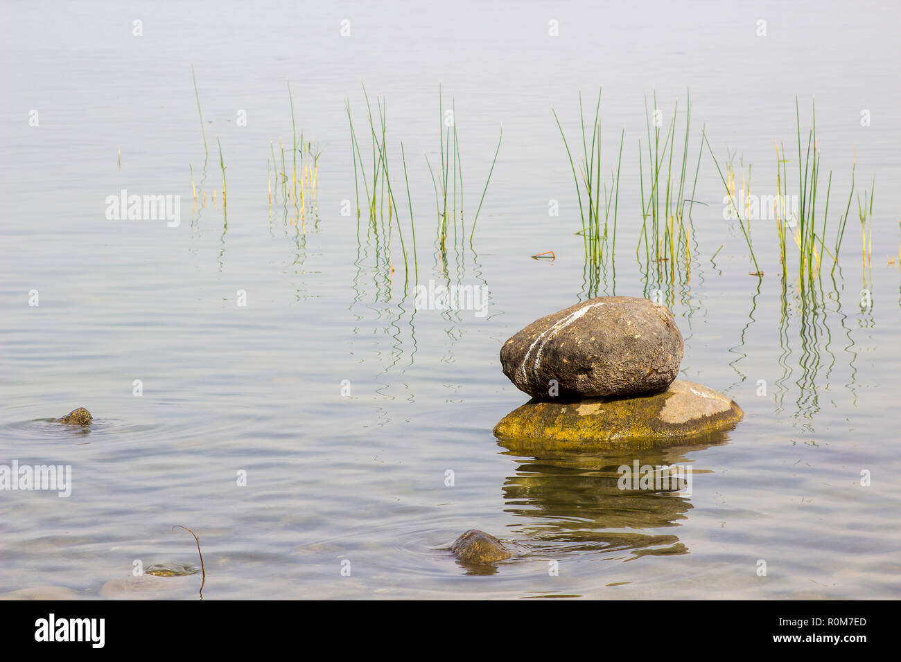 3 May 2018 Rocks piled together in flat calm shallows of the Sea Of ...