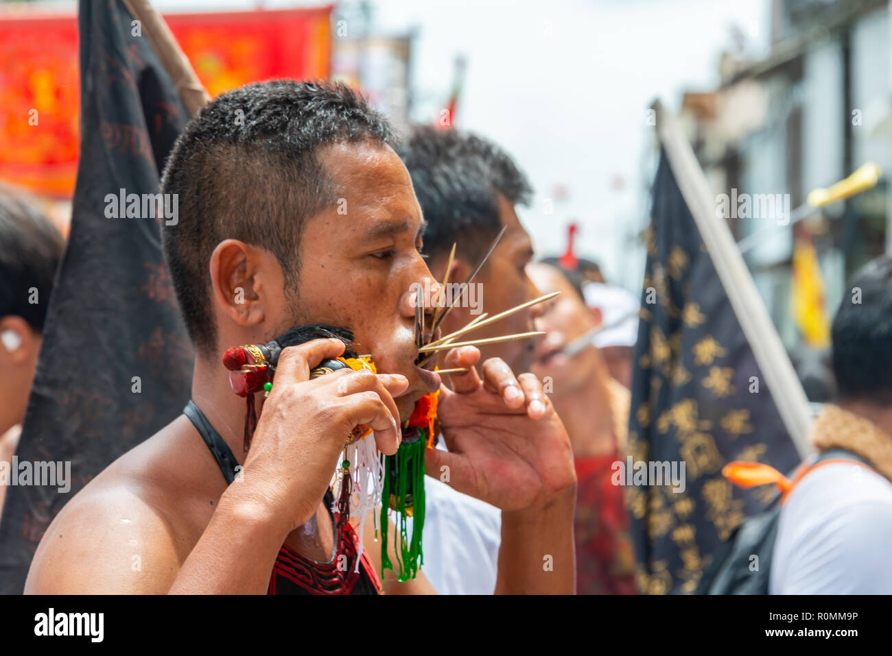 Man sword in mouth festival hi-res stock photography and images - Alamy