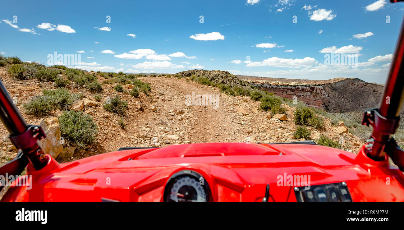 Moab off road trail seen from inside a red vehicle Stock Photo - Alamy
