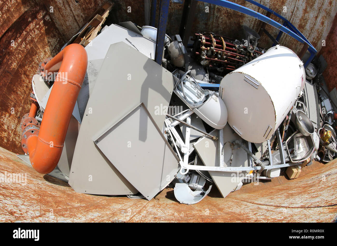 container with a lot of old iron in a recycle center where they recover ...