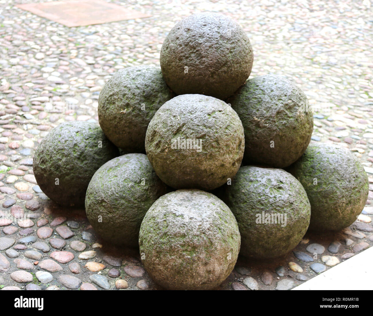 many ancient cannonball made with stone Stock Photo - Alamy
