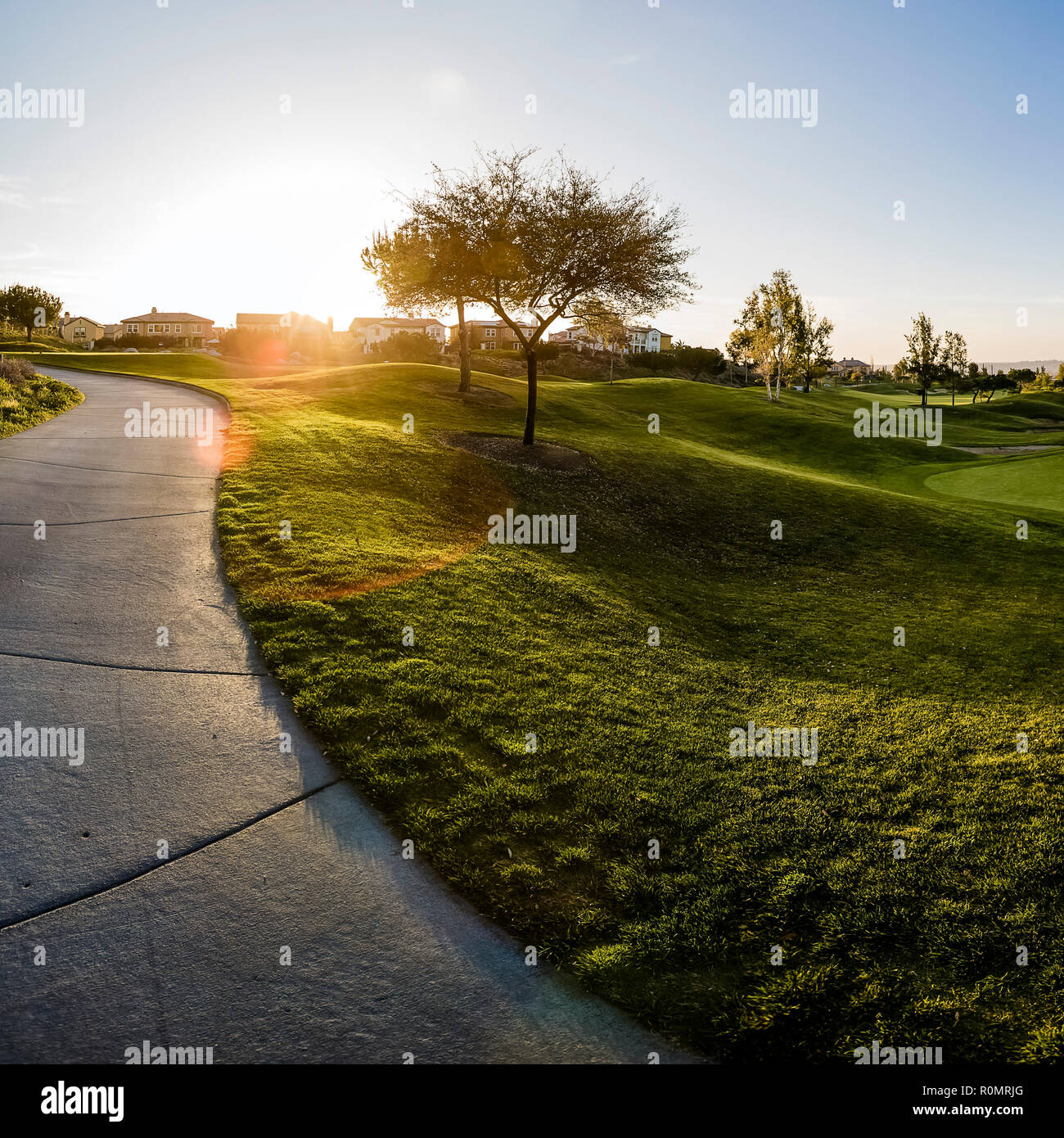 Sidewalk grass sunset hi-res stock photography and images - Alamy
