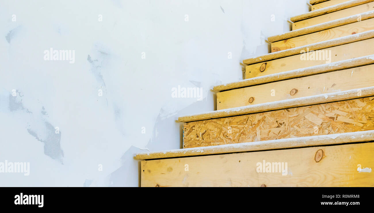 Stairs inside of a house undergoing construction Stock Photo - Alamy