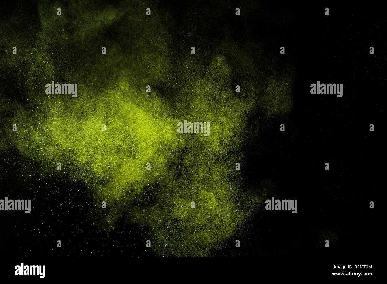 Abstract green paint Holi. Abstract green powder explosion on black ...