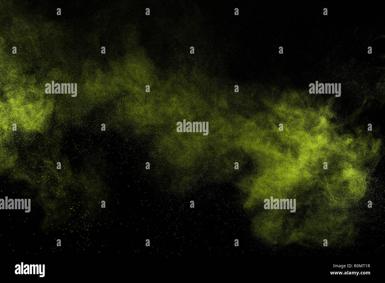 Abstract green paint Holi. Abstract green powder explosion on black ...