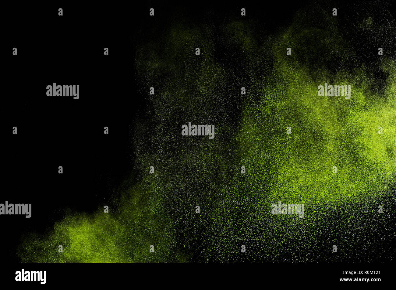 Abstract green paint Holi. Abstract green powder explosion on black ...