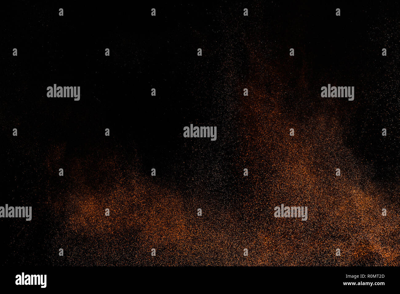 Abstract orange paint Holi. Abstract orange powder explosion on black ...