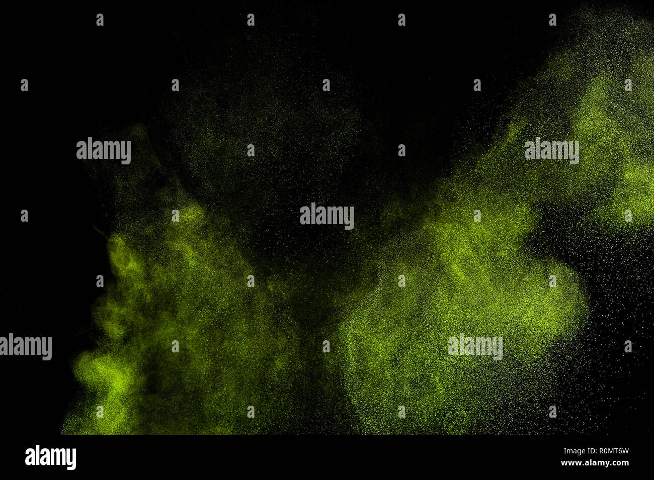 Abstract green paint Holi. Abstract green powder explosion on black ...