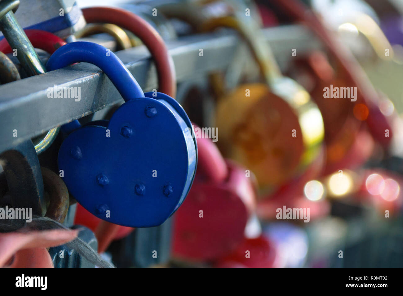 Blue padlock. Close-up. Blurred background Stock Photo - Alamy