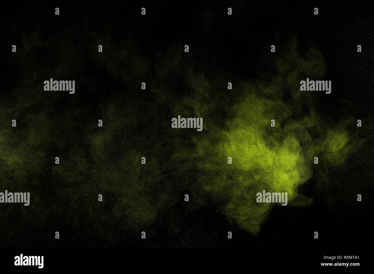 Abstract green paint Holi. Abstract green powder explosion on black ...