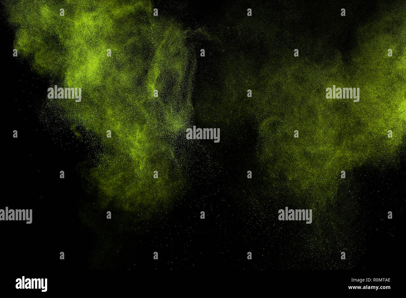 Abstract green paint Holi. Abstract green powder explosion on black ...