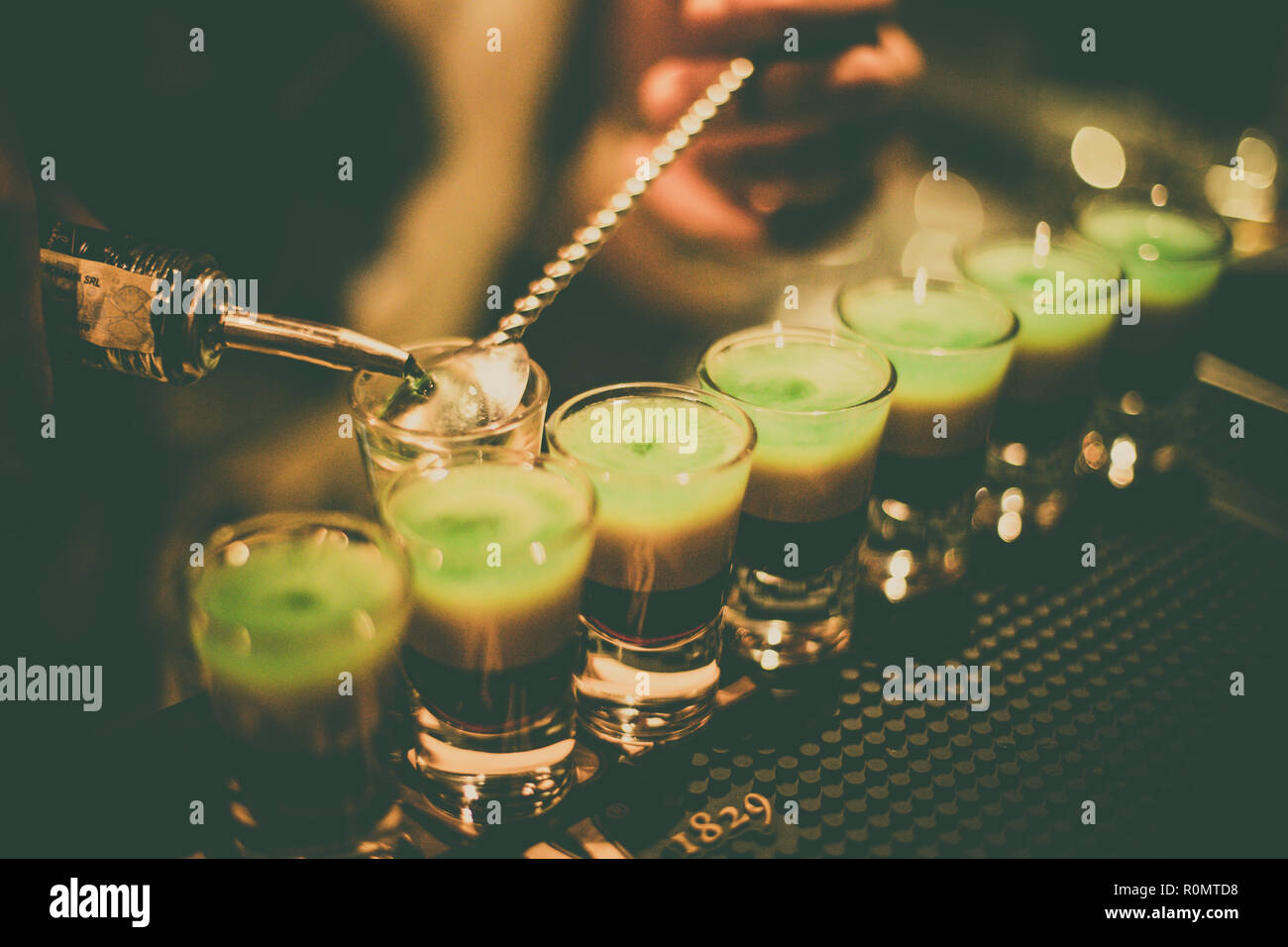 Barman pouring whiskey shot glass hi-res stock photography and images ...