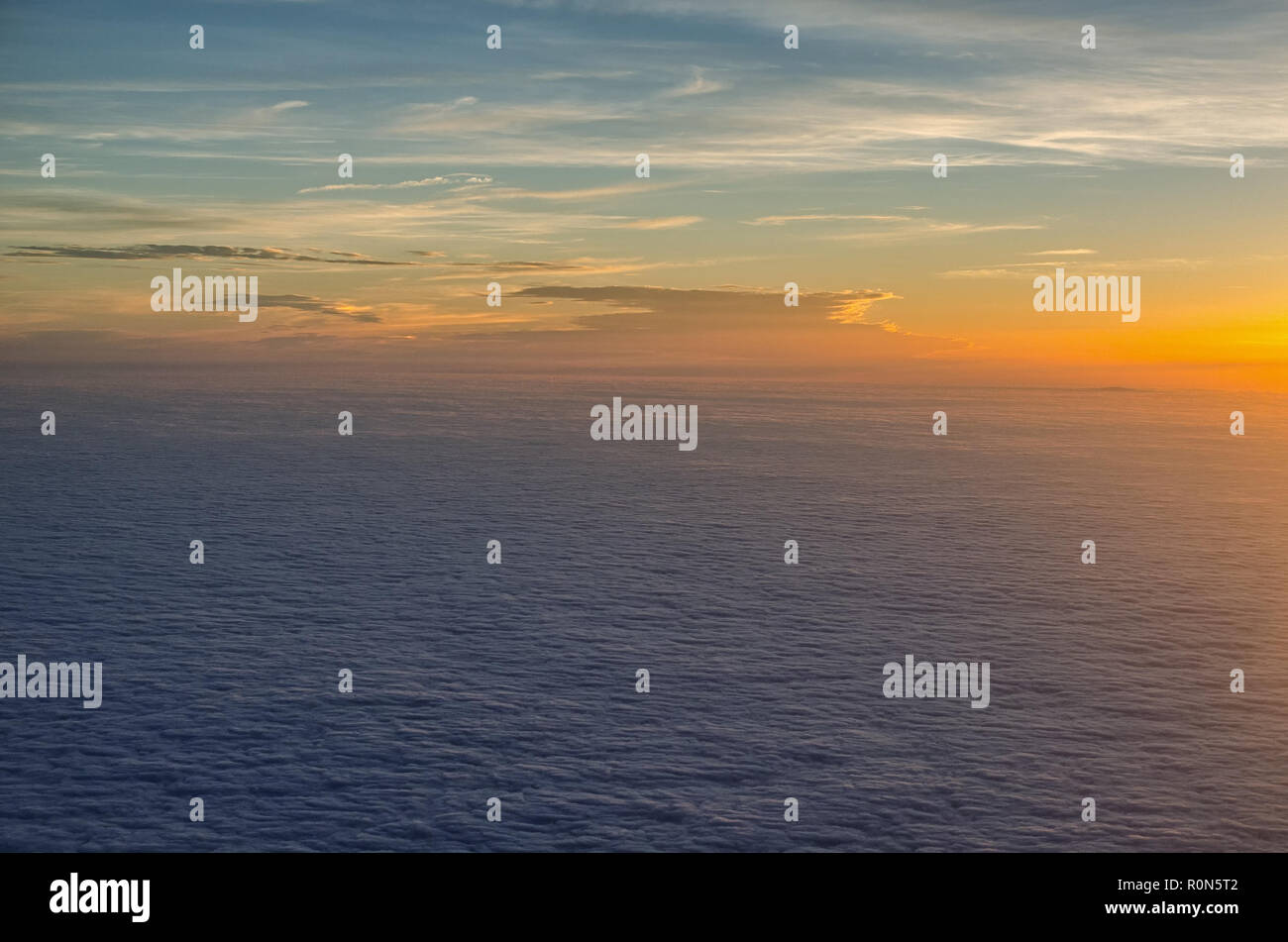 atmospheric mood above the clouds at sunset Stock Photo - Alamy