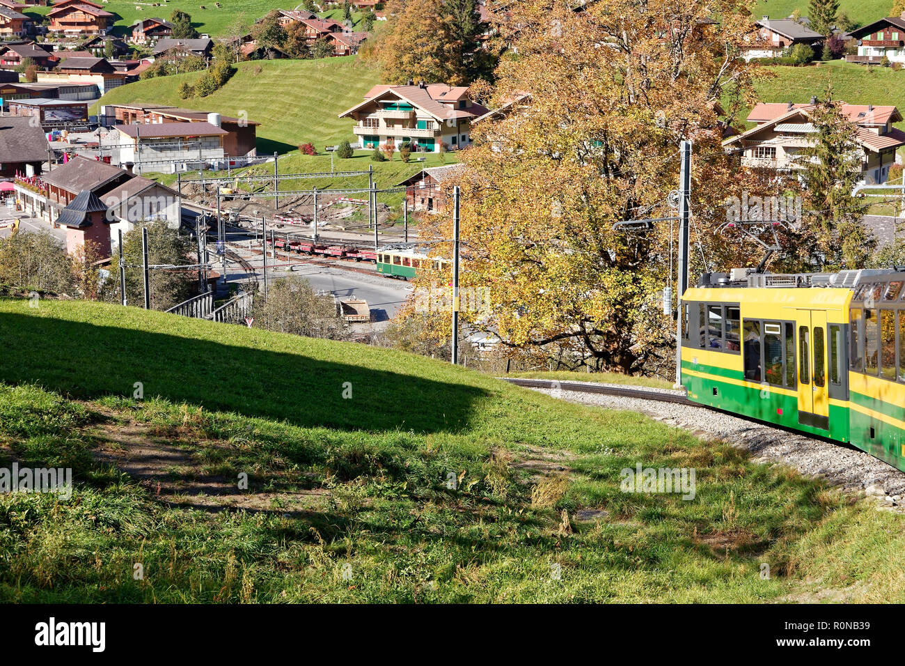 Train approaching Grindelwald Grund trainstation, Jungfrau Region ...
