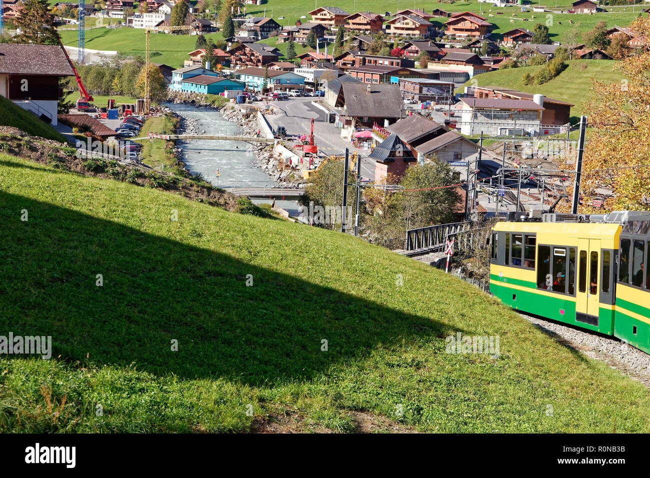 Train approaching Grindelwald Grund trainstation, Jungfrau Region ...