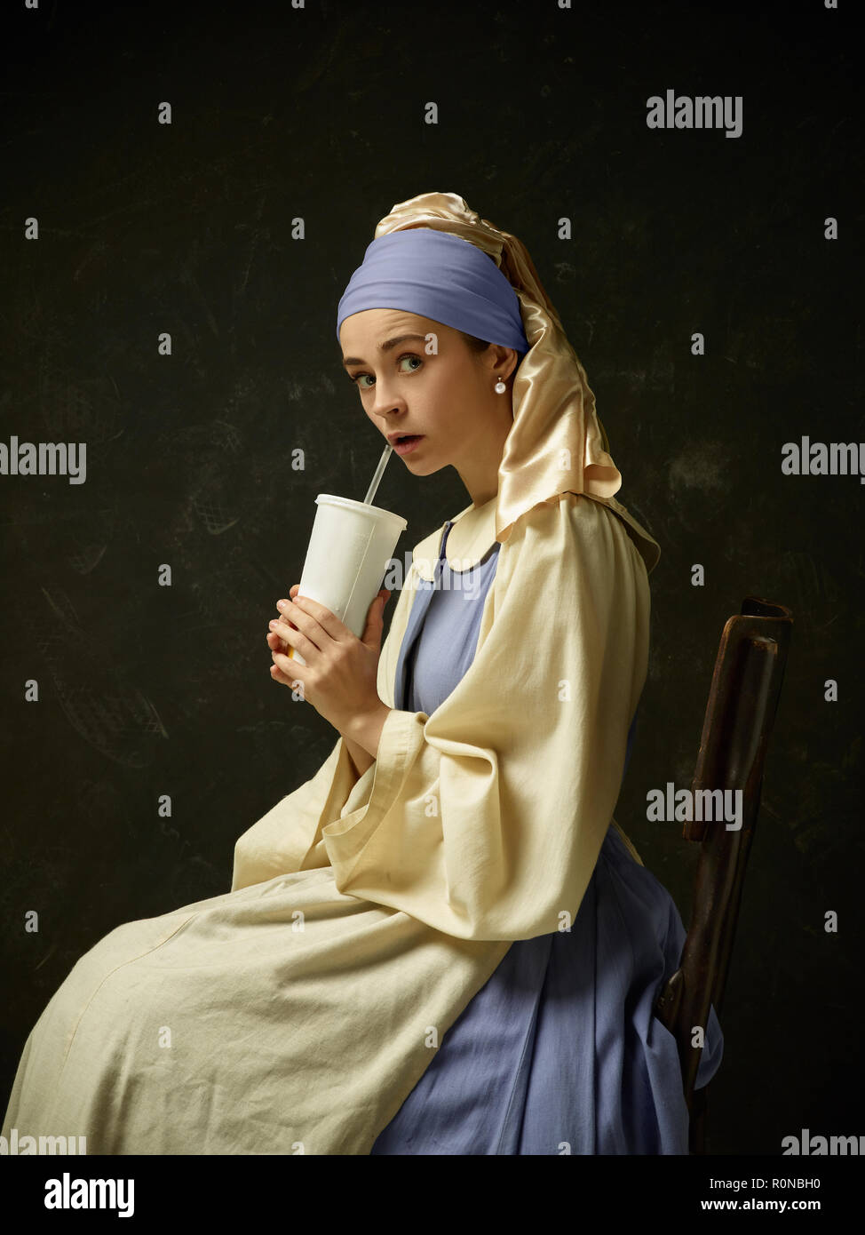 Medieval Woman in Historical Costume Wearing Corset Dress and Bonnet ...