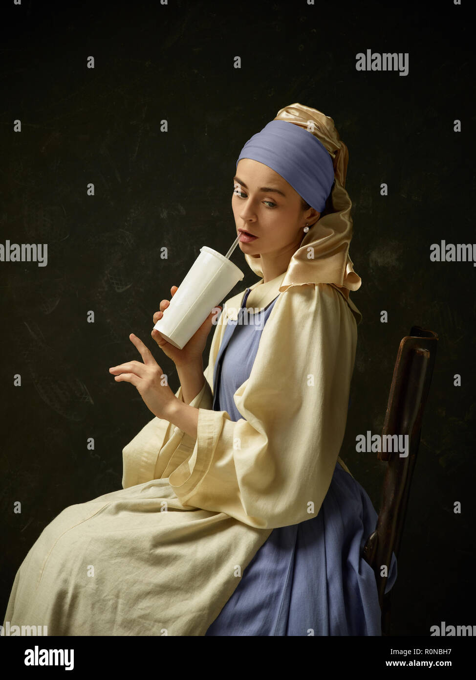 Medieval Woman in Historical Costume Wearing Corset Dress and Bonnet ...