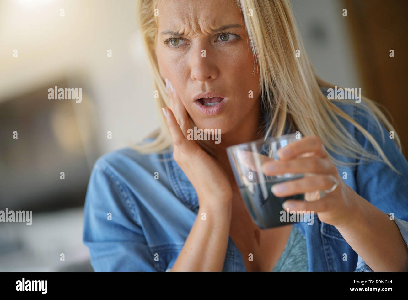 Portrait old woman having toothache hi-res stock photography and images ...
